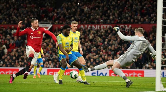 Pitch invasion goes wrong as fan ends up falling flat on his face ...