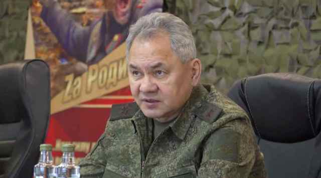Russian defence minister pays rare visit to troops in Ukraine | World ...