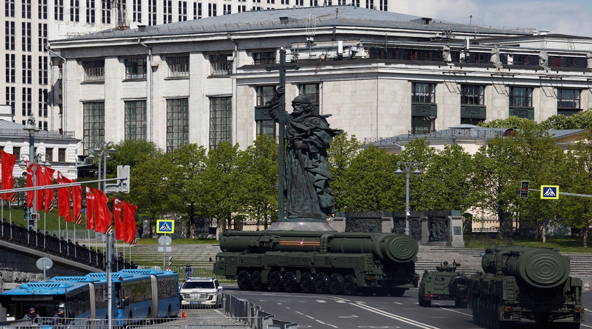 Russia fires missiles at Ukraine before Putin presides over parade ...