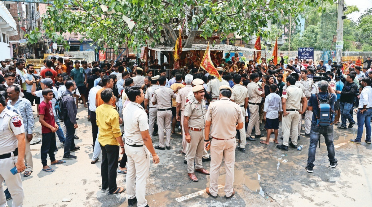 Protests, political slugfest after removal of grille near temple ...