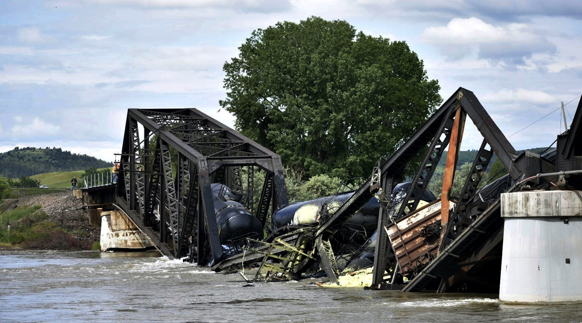 Freight train carrying hot asphalt, molten sulfur plunges into ...
