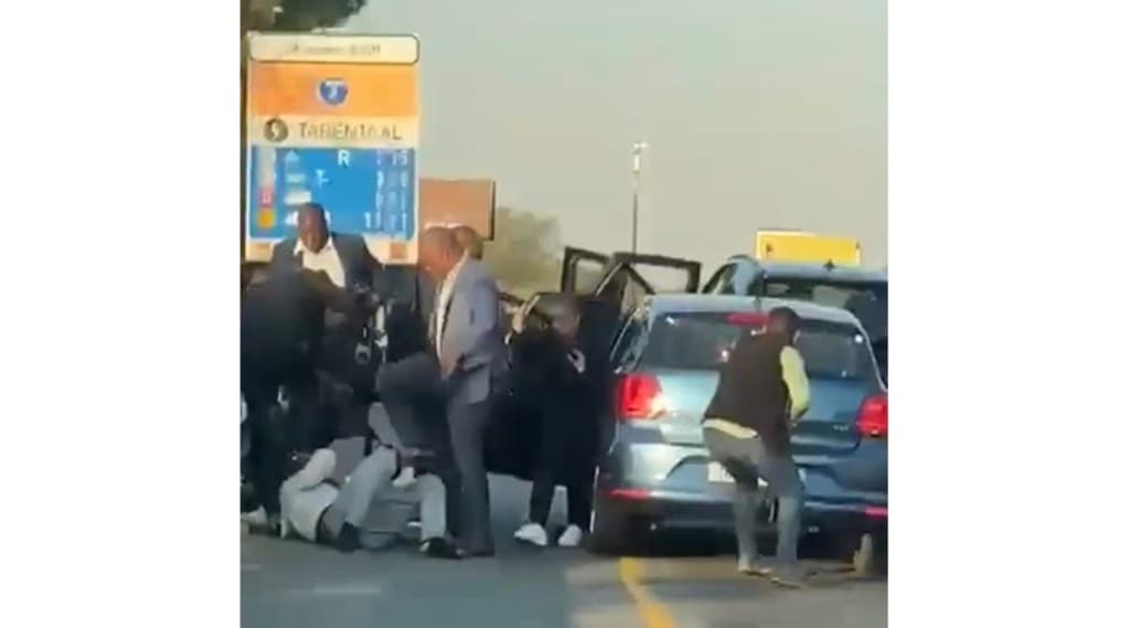 Outrage in South Africa over video of armed police officers stomping on ...