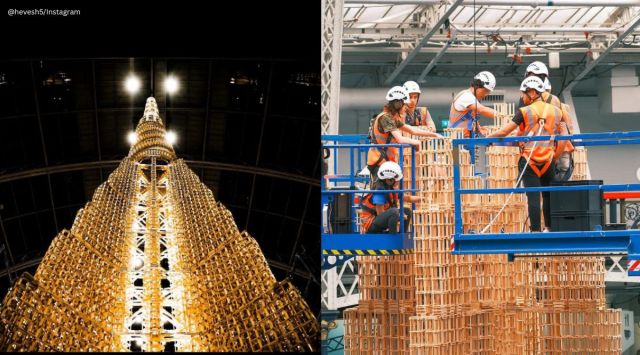 Watch: Artists create the world’s largest toy tower and then topple it ...