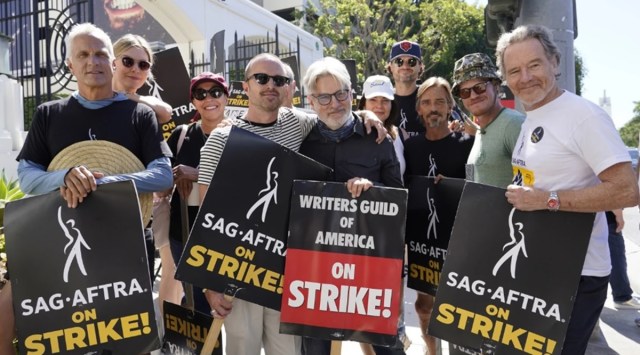 Breaking Bad stars reunite on picket line to call for studios to resume ...