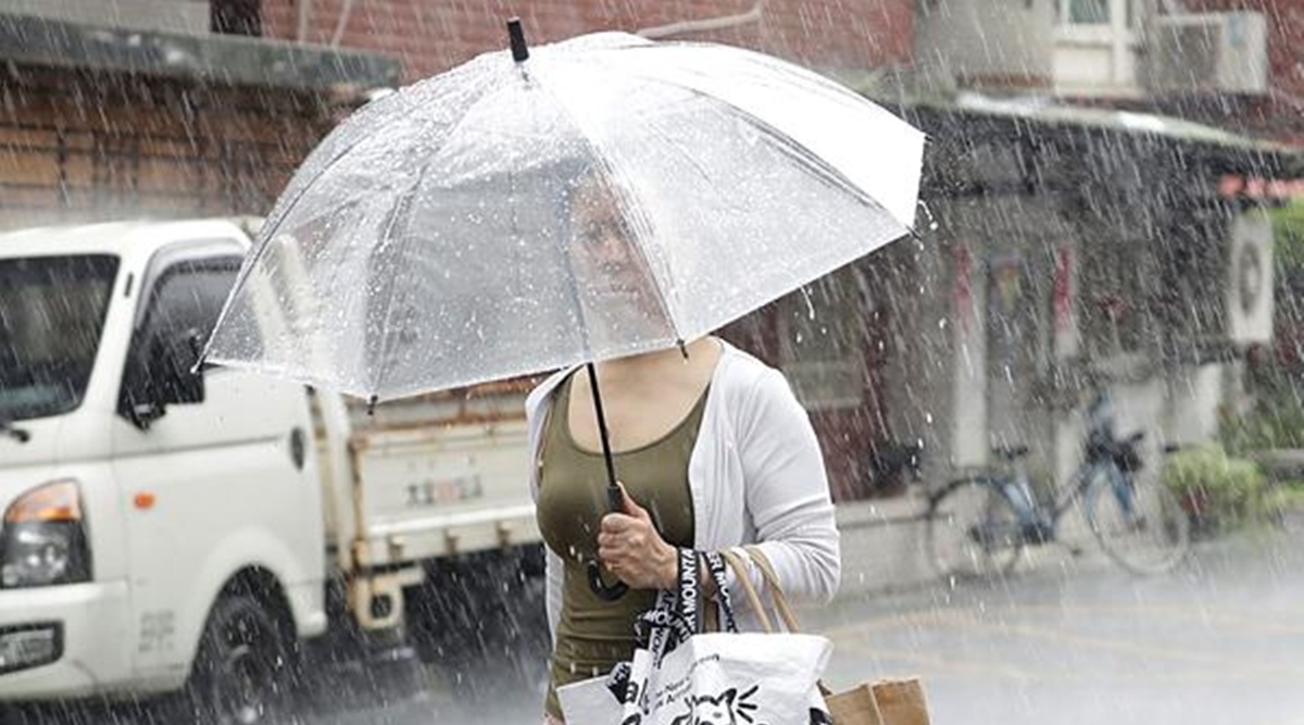 Trains suspended, people warned away from the coastline as Typhoon ...