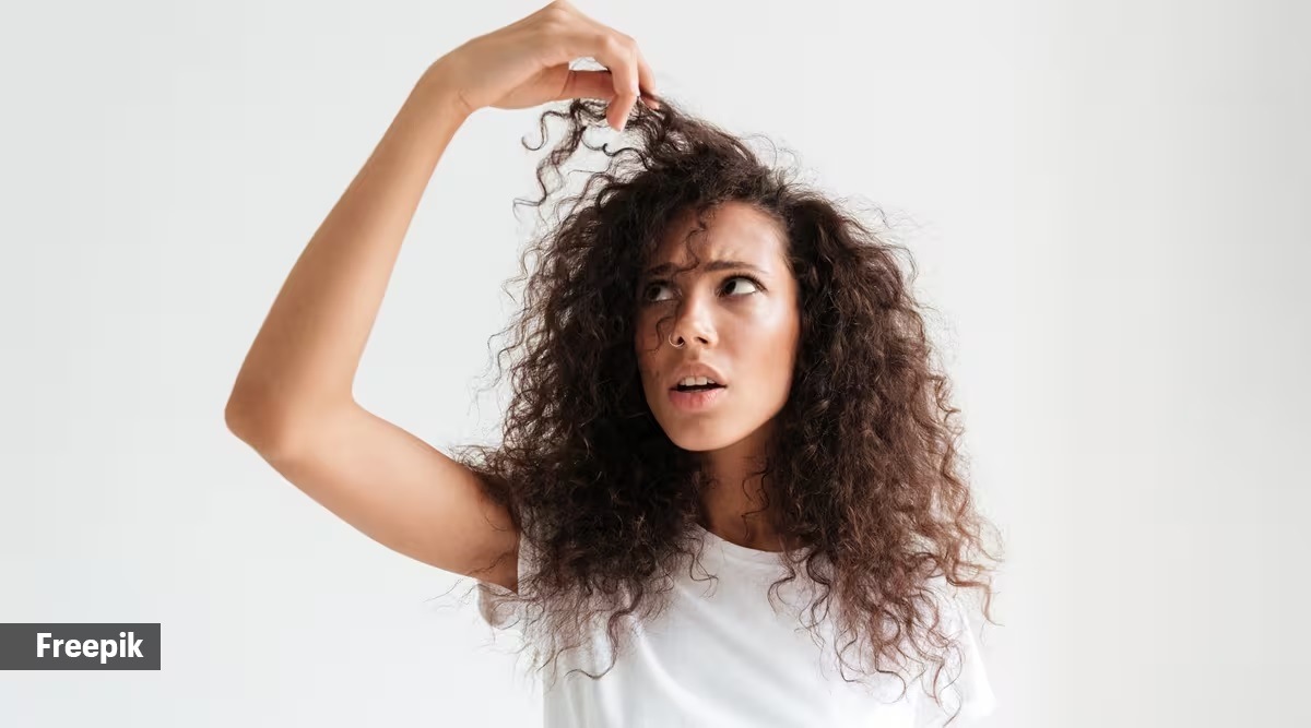 Why does your hair curl in the summer? A chemist explains the science ...