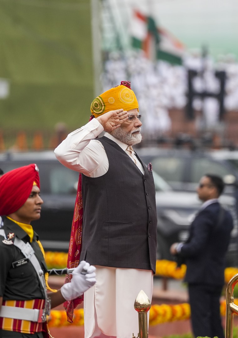 PM Narendra Modi wears multicoloured Bandhani print turban on ...
