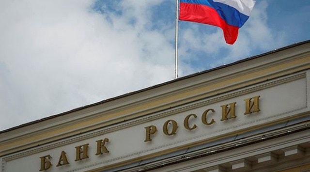 Russian central bank jacks up rates to 12% to support battered rouble ...
