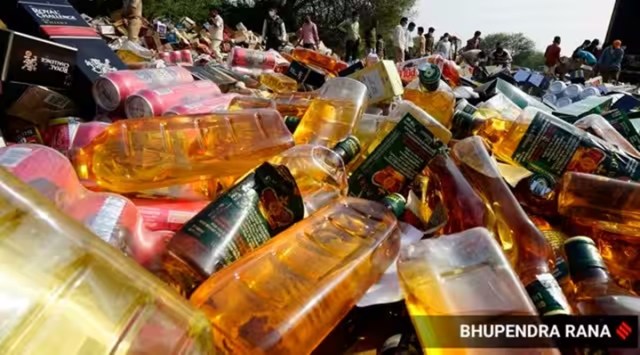 Surat ASI, aide caught with 624 liquor bottles worth Rs 96,000 in ...