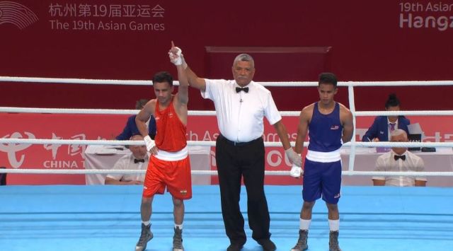 Asian Games: Steady jabs from Deepak Bhoria wear out Malaysian Qaiyum ...