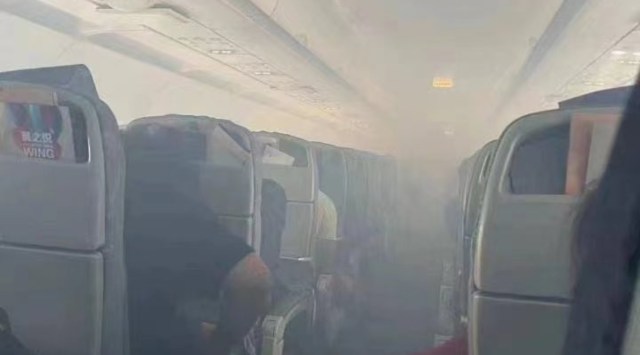 Air China Flight Evacuated After Engine Fire Sends Smoke Into Cabin World News The Indian