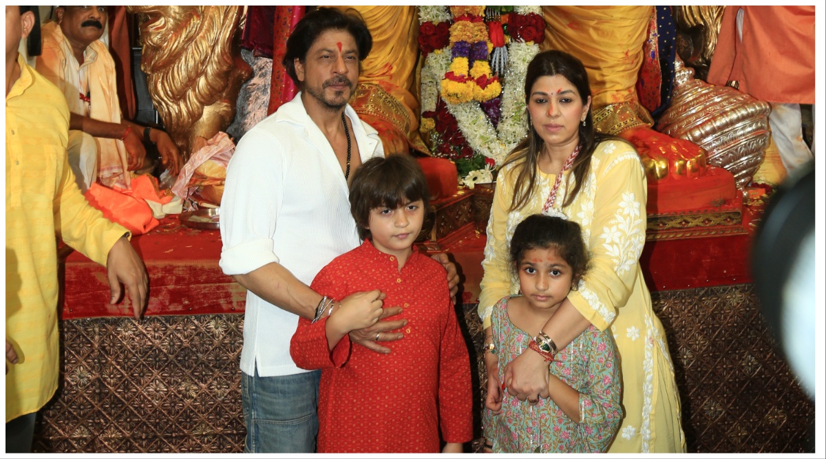 Shah Rukh Khan shields AbRam from crowd as they visit Mumbai’s ...