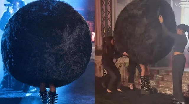 Watch: Model dressed as giant furball gets lost on runway, crashes into ...