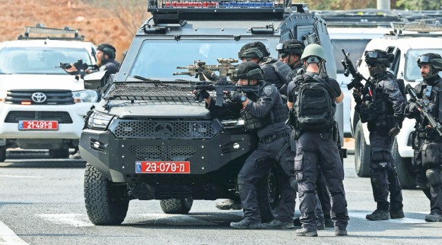 Israel to launch tougher military action, toll rises to nearly 1,000 ...