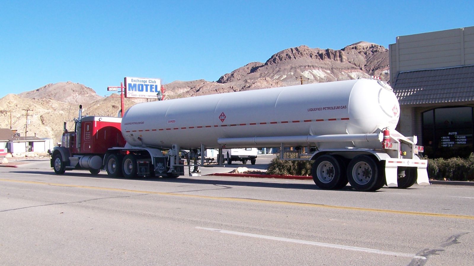 Environmental officials working to clean up fuel after fiery tanker ...