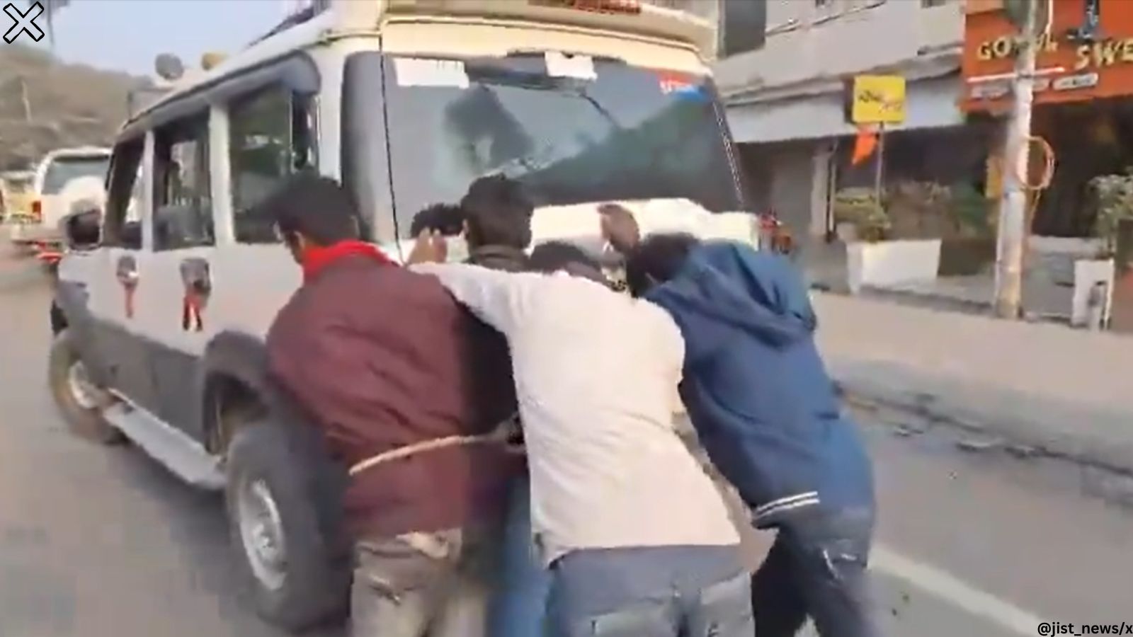 Watch: Viral video shows accused pushing police van after it runs out ...