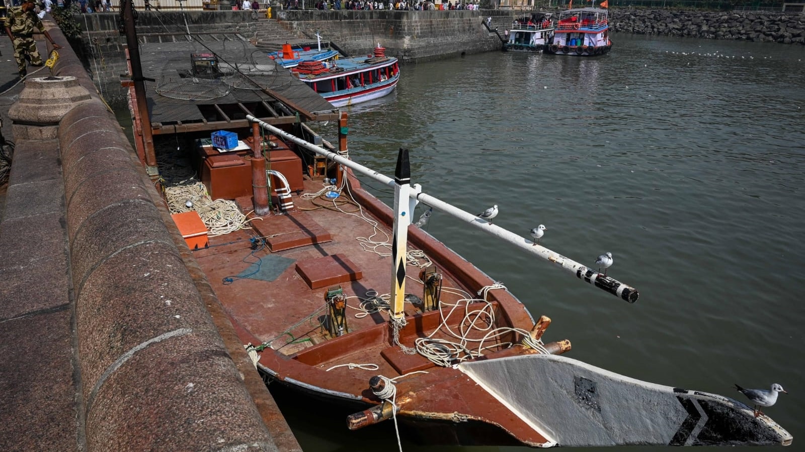 Police launch probe after suspicious fishing boat found loitering near ...