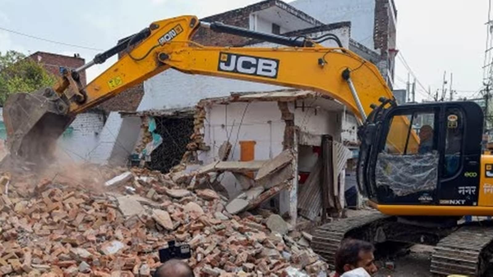 MCD razes four properties belonging to accused in drug peddling cases | Delhi News - The Indian ...