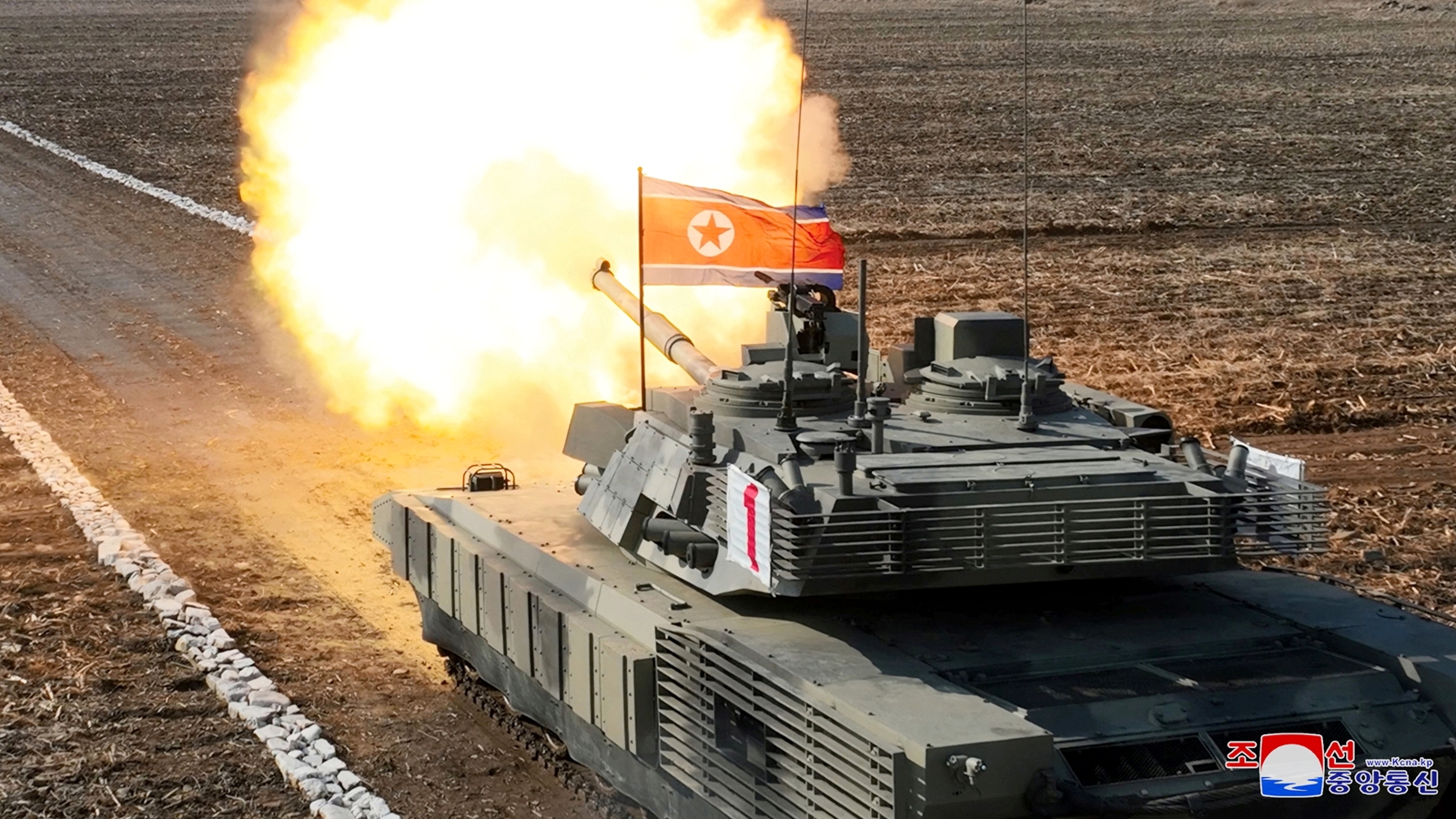 North Korea’s Kim Jong Un ‘drives’ new tank during mock battle | World ...