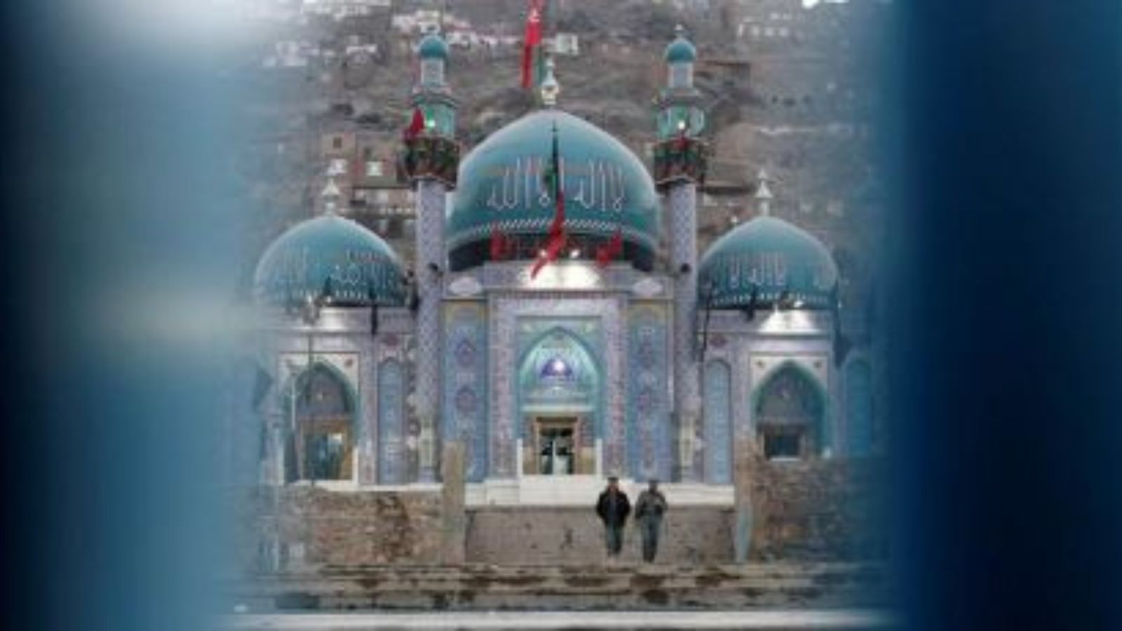 A gunman kills 6 worshippers inside a Shiite mosque in western ...