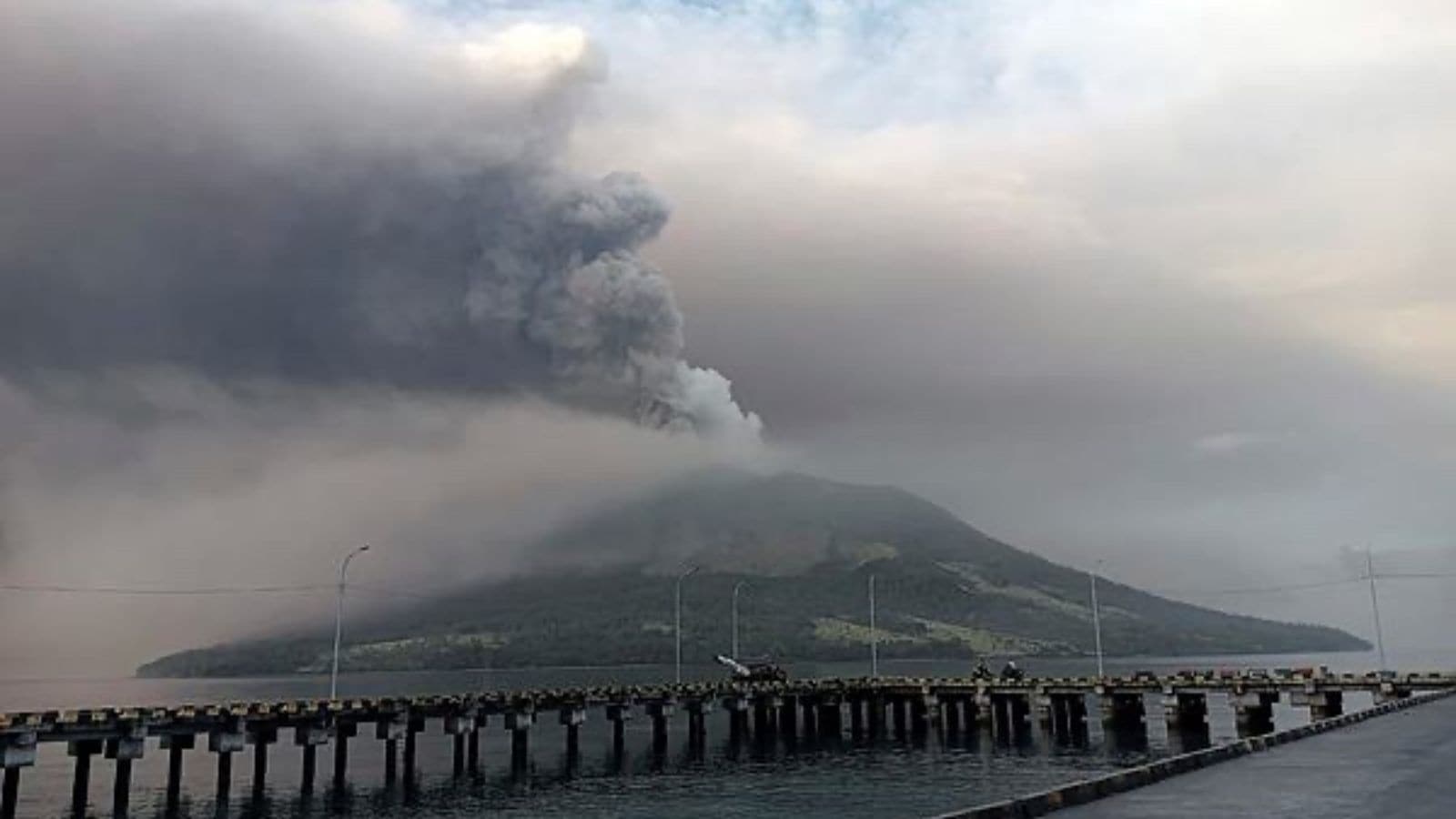 Indonesia's Mount Ruang erupts again, spewing ash and peppering ...