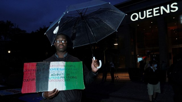 Hundreds of pro-Palestinian protesters rally in the rain in DC to mark ...