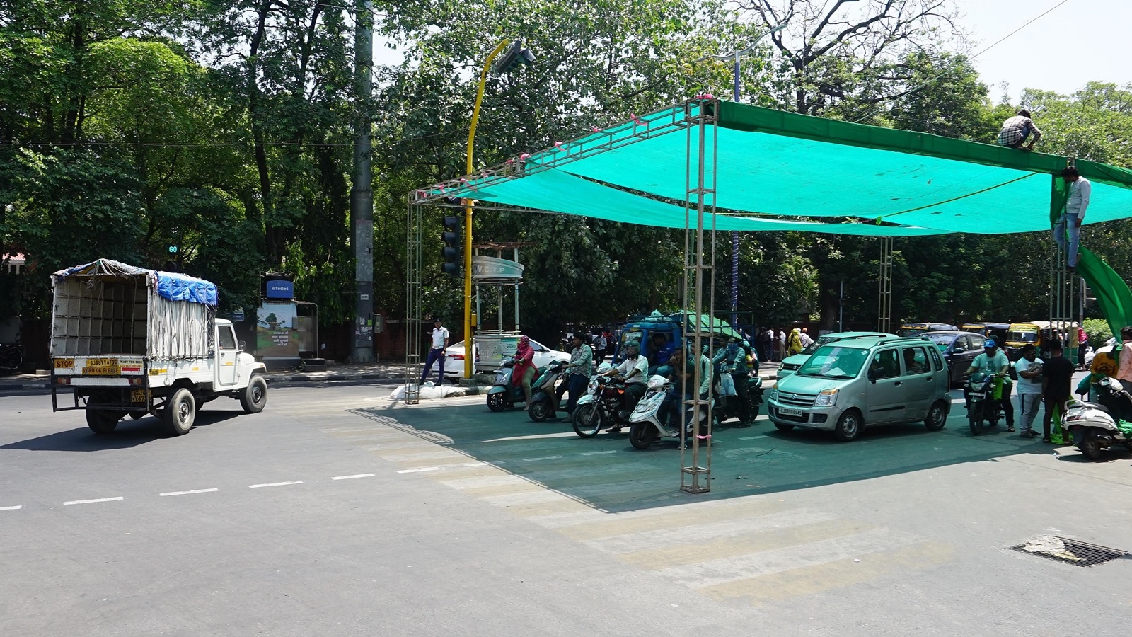 Vadodara police to book luxury bus driver after traffic shade collapses ...