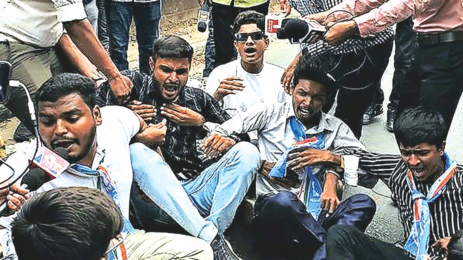 NSUI workers clash with cops during protest; eight detained | Ahmedabad ...