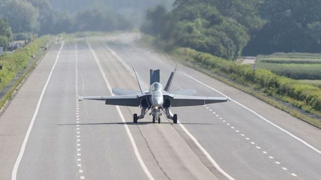 Swiss air force lands fighter planes on motorway in training exercise ... Swiss air force lands fighter planes on motorway in training exercise ...