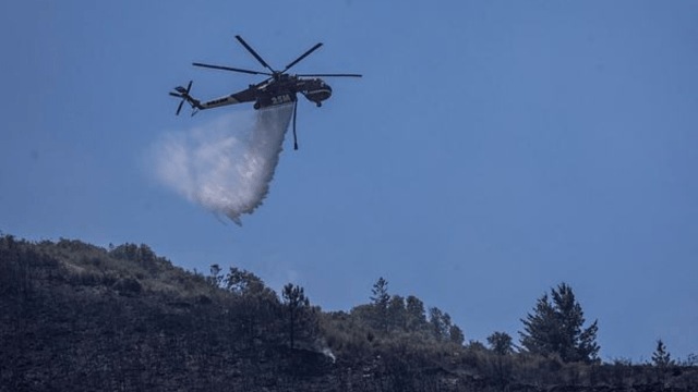 New Mexico wildfire claims second life, while rain offers hope of relief
