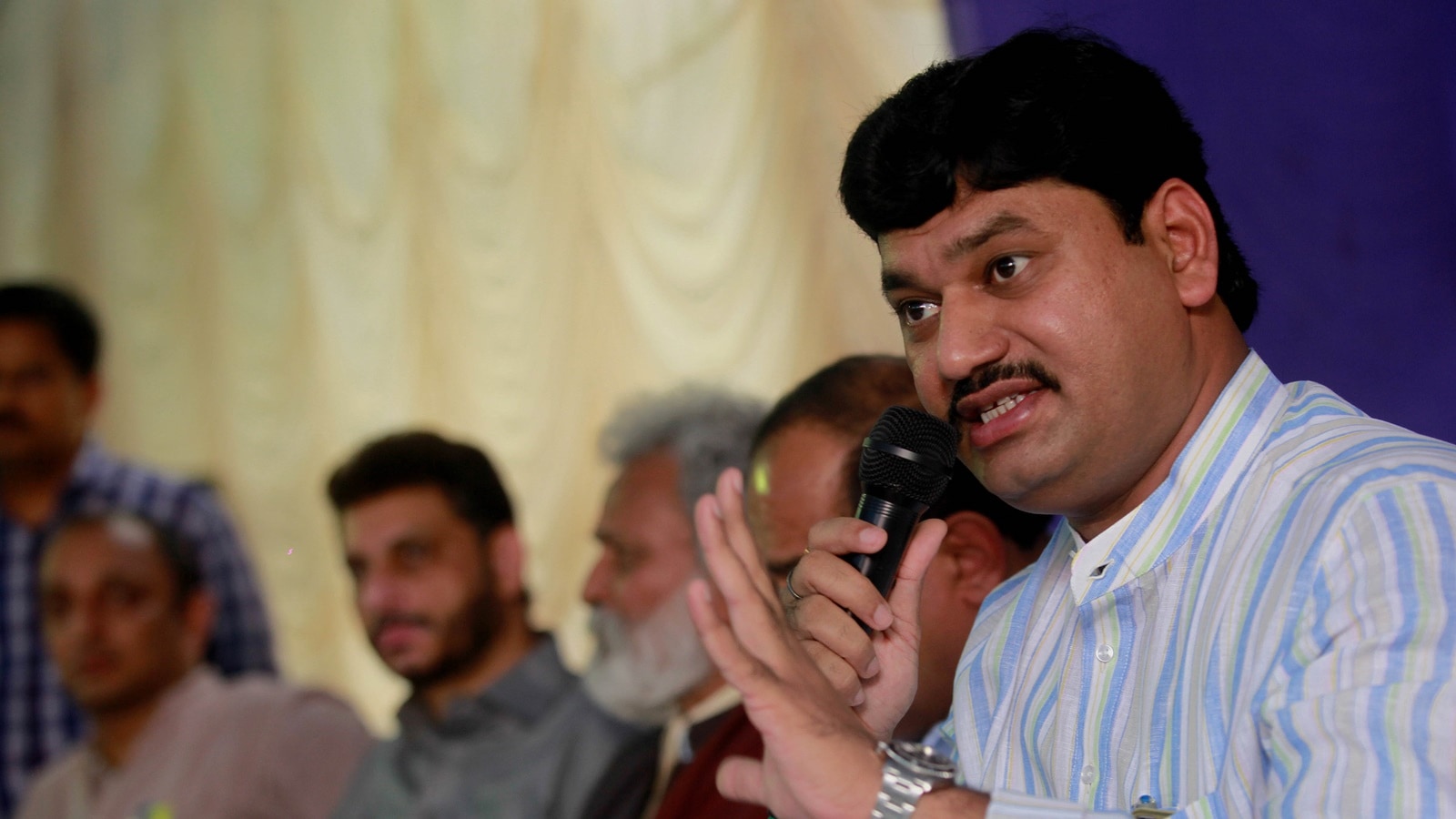 Caught in controversy, Dhananjay Munde’s absence from PM events raises ...
