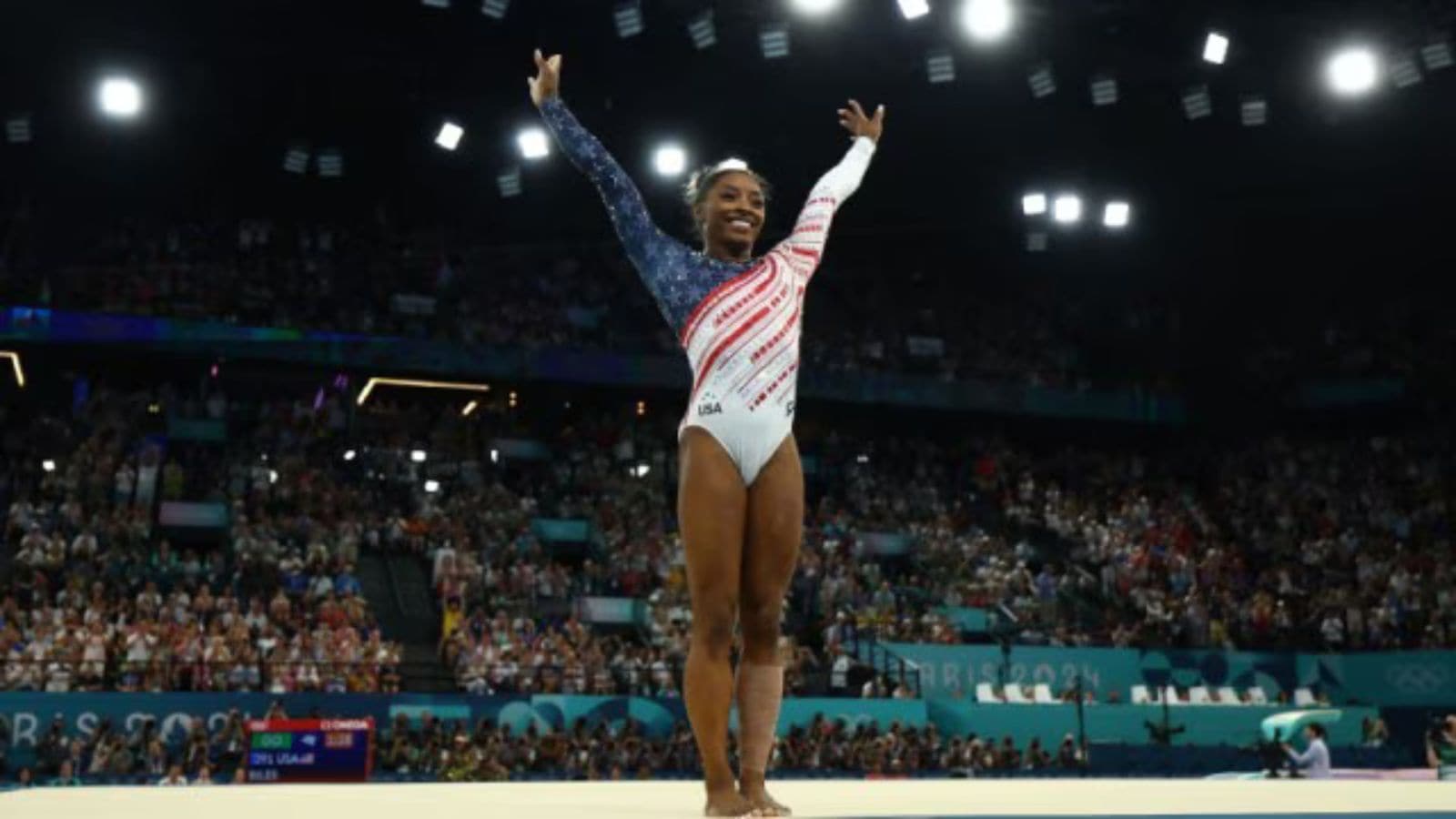 Simone Biles flaunts ‘GOAT’ necklace made of 546 diamonds as she clinches second gold medal at ...