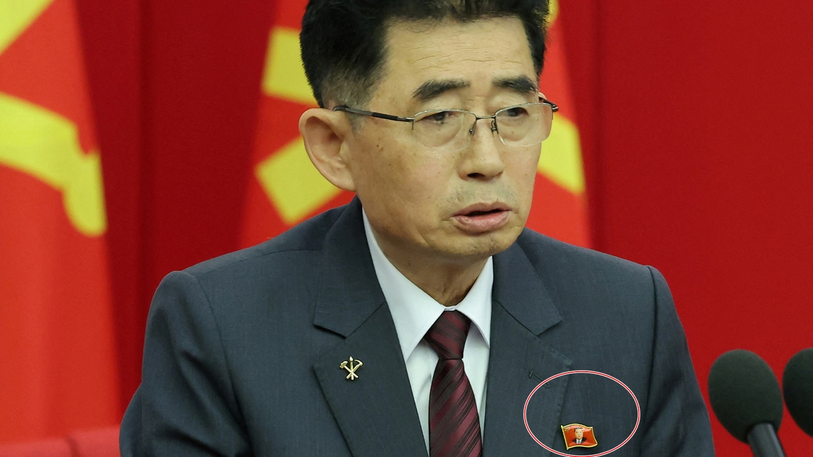 North Koreans are seen wearing Kim Jong Un pins for the first time as ...