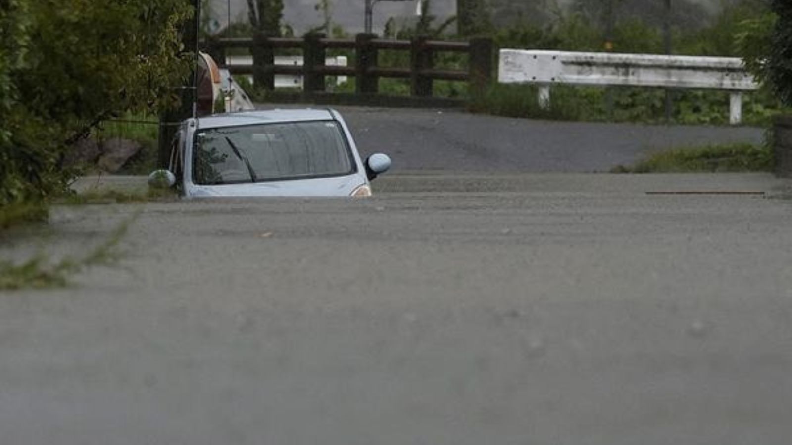 Slow tropical storm dumps heavy rain around Tokyo after causing floods ...