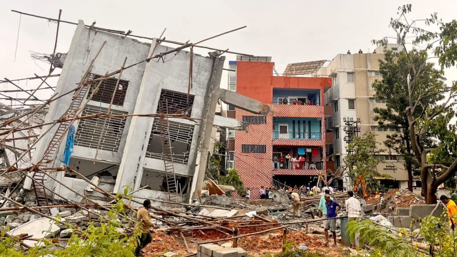 Worker killed and 5 missing after under-construction building collapses ...