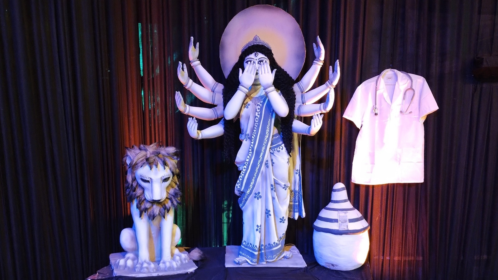 Maa Durga covering her face in shame, doctor’s idol, light shows: how ...