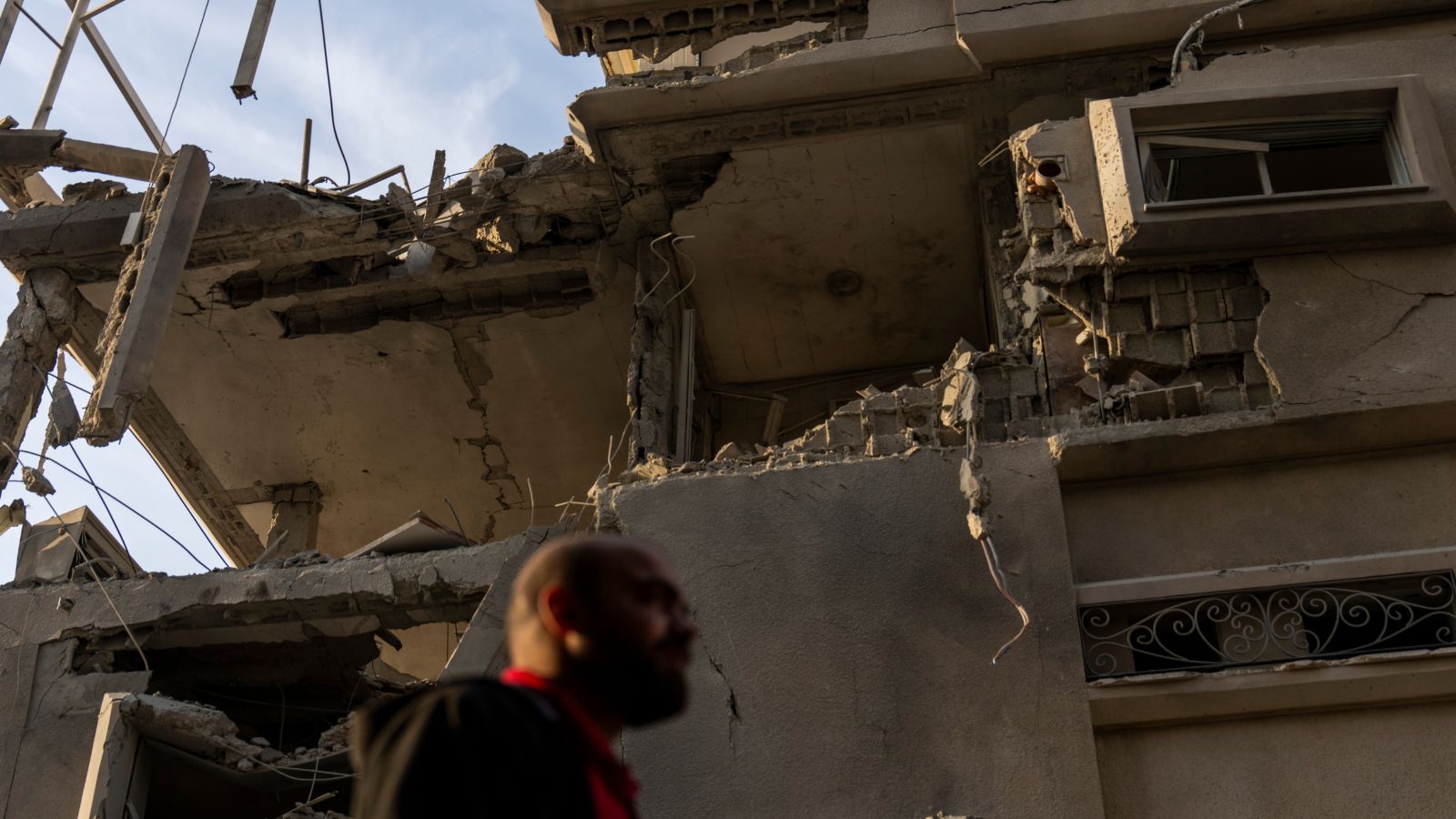 Attack on central Israel injures 11 as Iran’s leader promises a ...