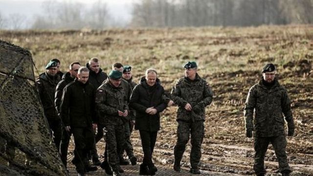 Poland’s prime minister visits defensive fortifications on border with ...