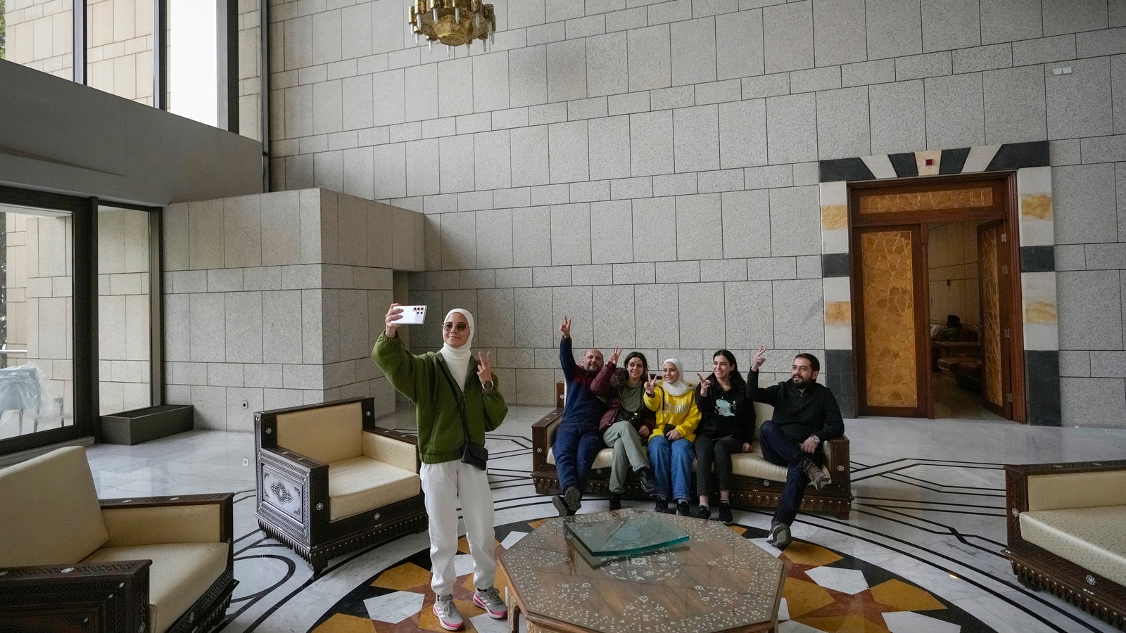 Ferraris, looted furniture, visitor selfies: Scenes from Bashar al ...