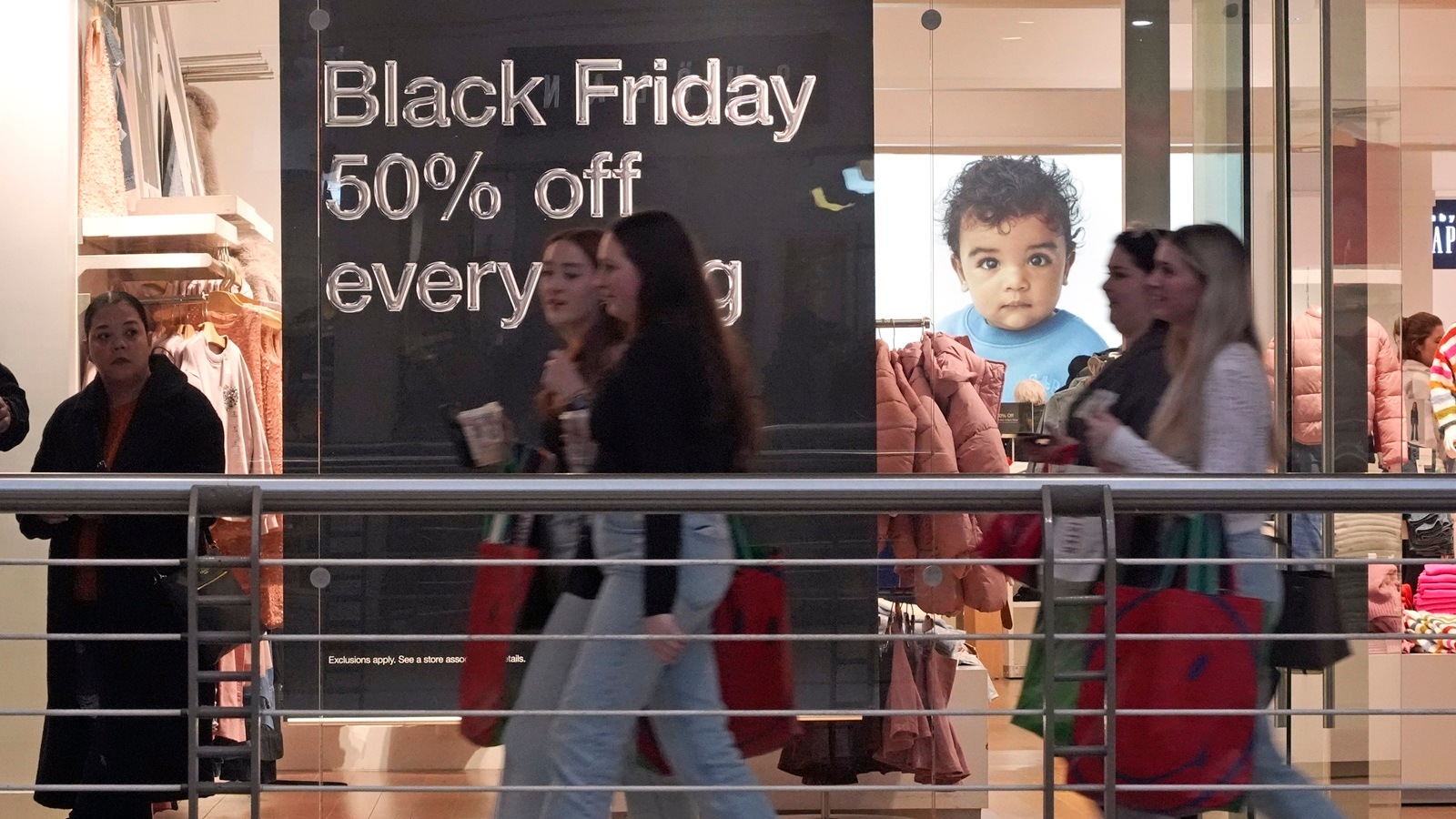 US Black Friday spending at stores inches ahead as Americans spend more ...