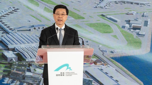 Hong Kong leader John Lee sacks two senior officials in aim to ‘do ...