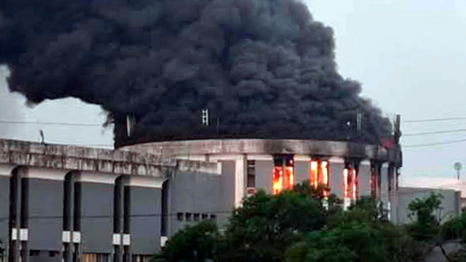 Liberia’s parliament building catches fire as anti-government protests ...