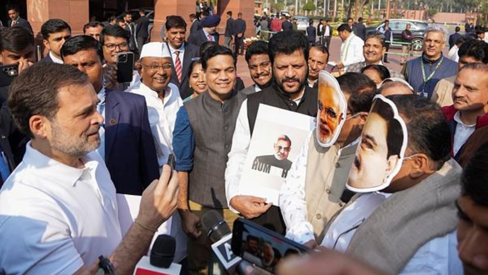 Congress MPs protest in Parliament with Modi and Adani masks, Rahul ...