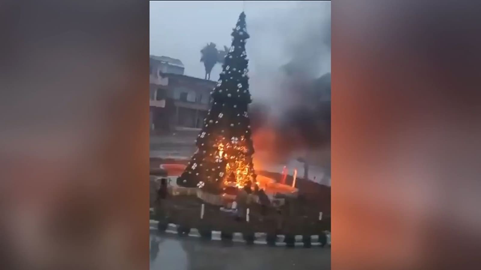 Watch: Hundreds protest in Syria after Christmas tree set on fire ...