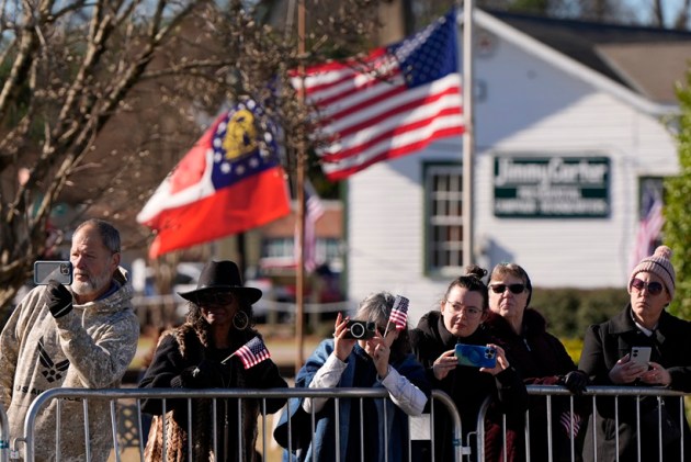 In pictures: Jimmy Carter’s farewell begins with motorcade through ...