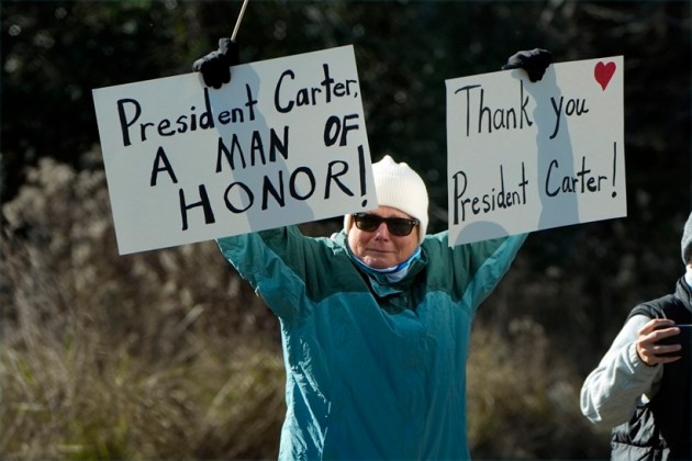 In pictures: Jimmy Carter’s farewell begins with motorcade through ...