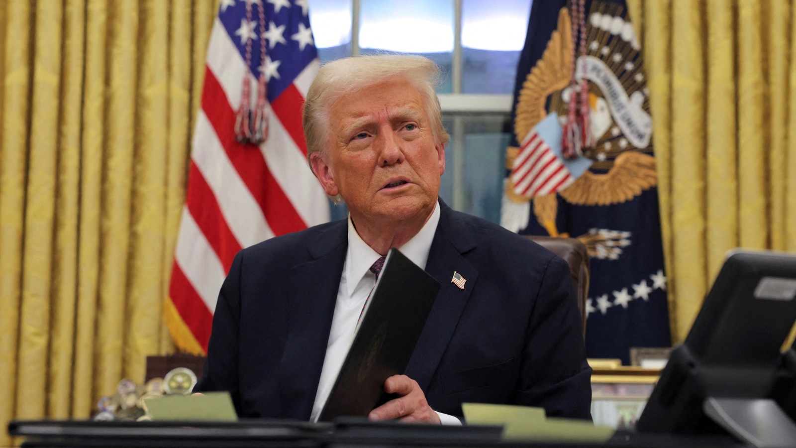 Trump signs executive order on establishment, implementation of DOGE ...