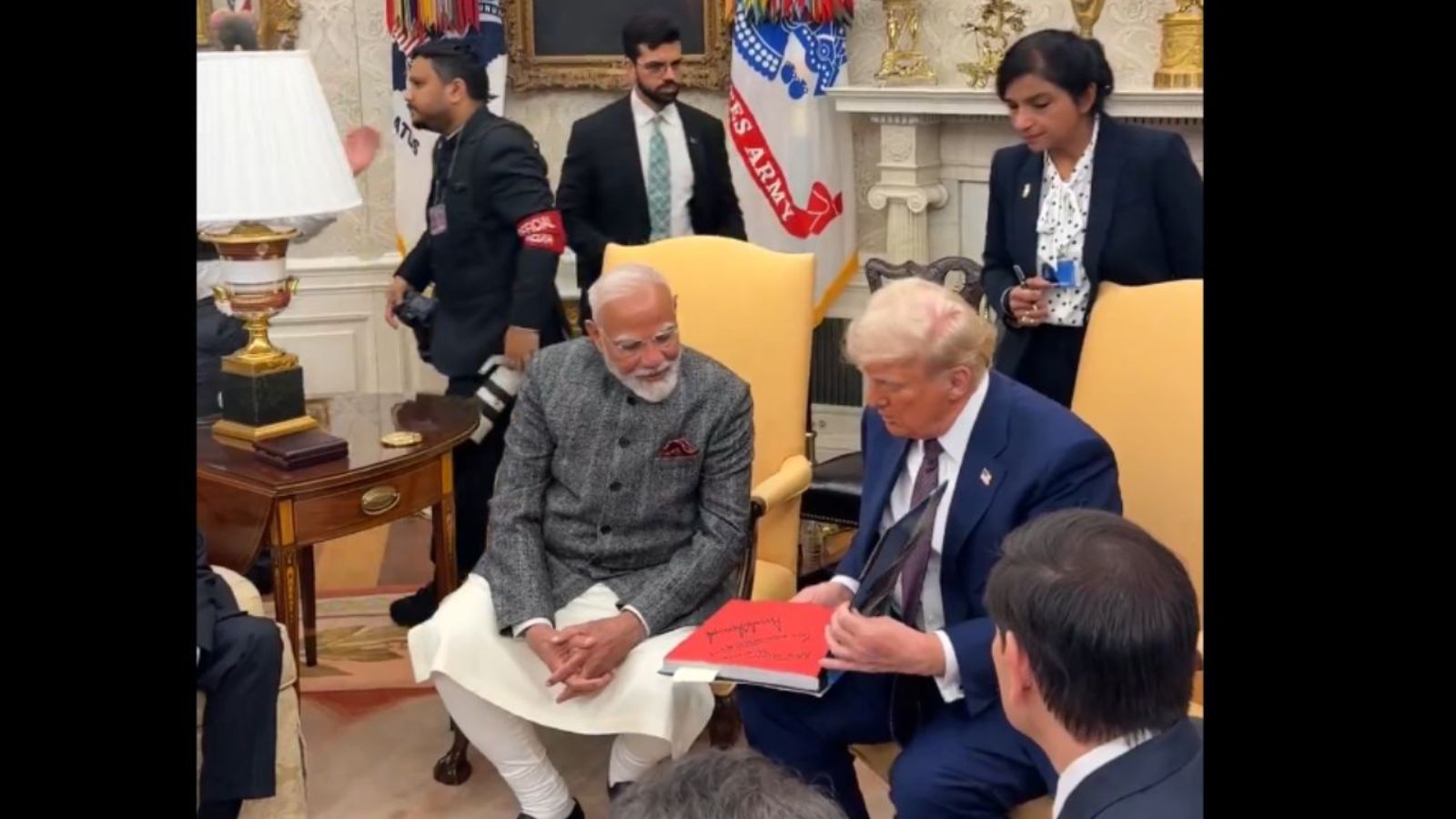 Trump surprises PM Modi with signed book, special photo from India ...