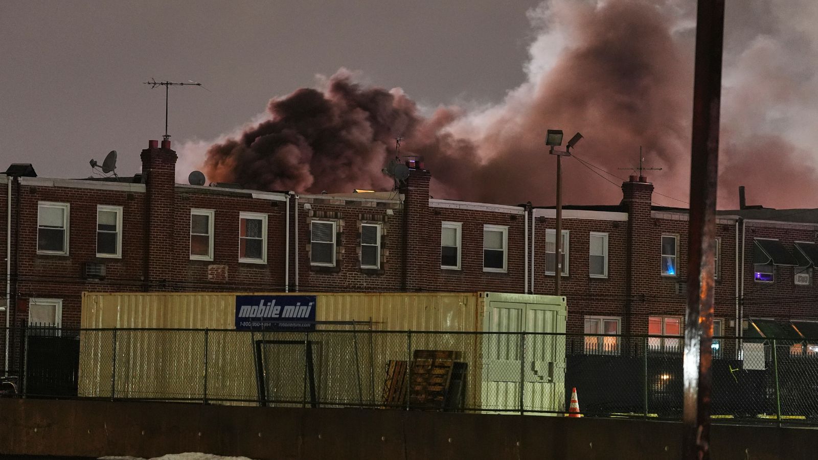 In pictures: Medical jet crashes in Philadelphia neighborhood, multiple ...