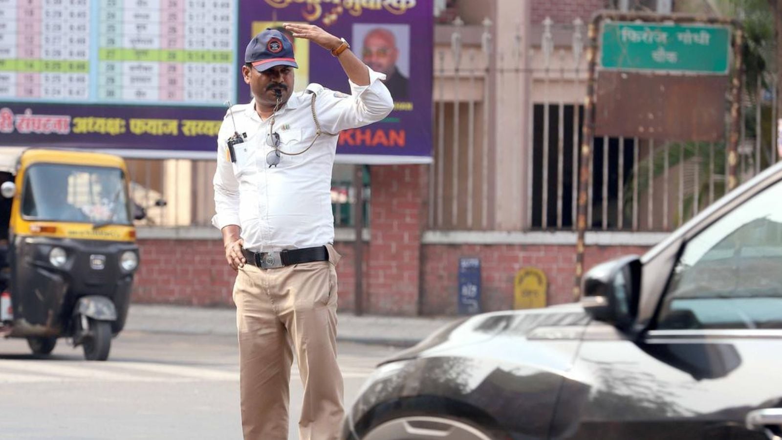 Standing guard in scorching heat: How Pune’s traffic police manage ...